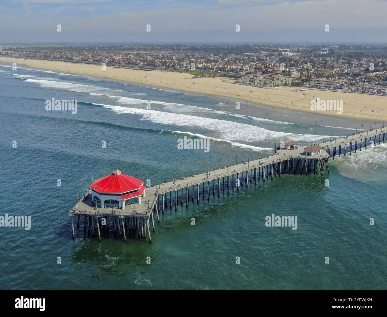 Aerial view of Huntington Pier, beach and coastline during sunny summer ...