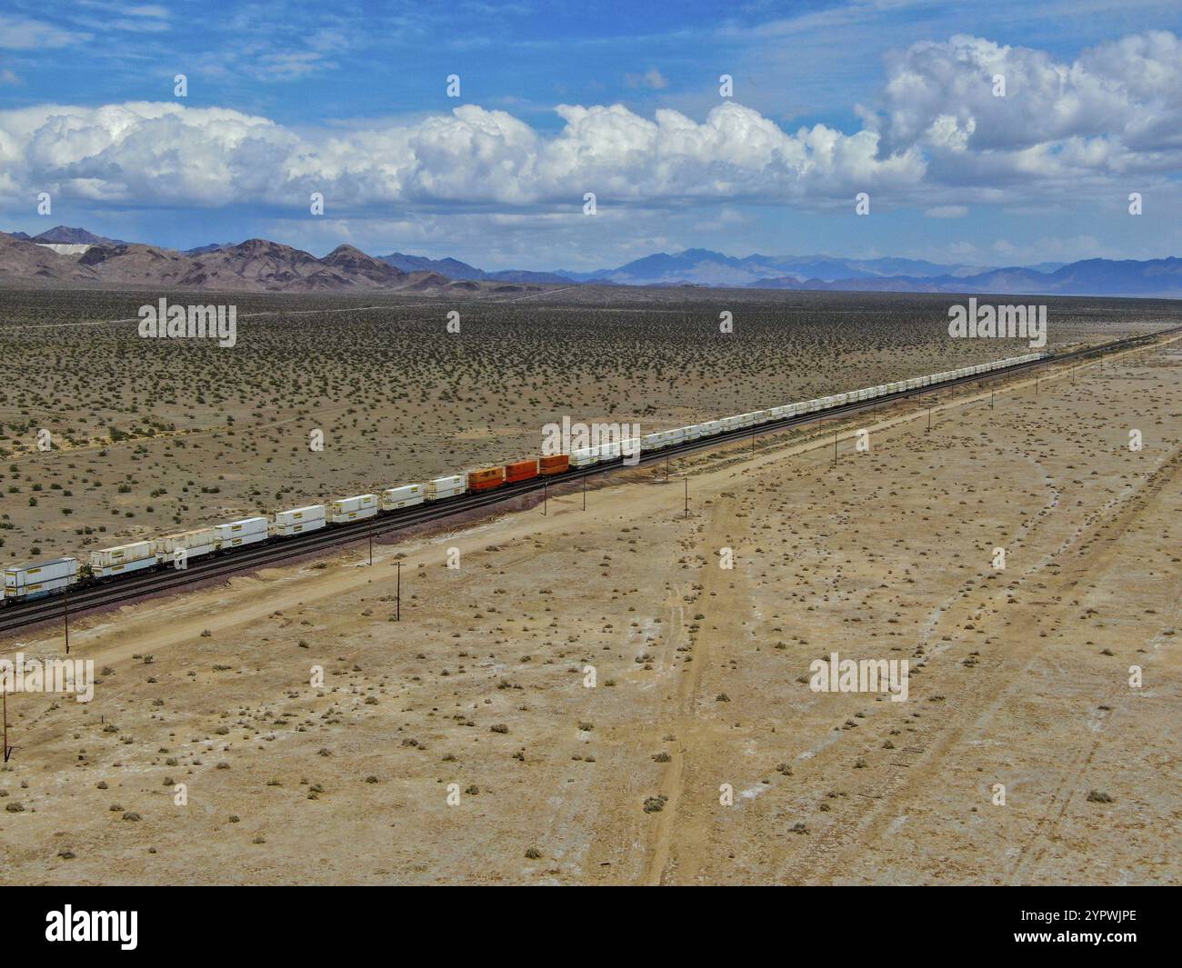 Cargo locomotive railroad engine crossing Arizona desert wilderness ...
