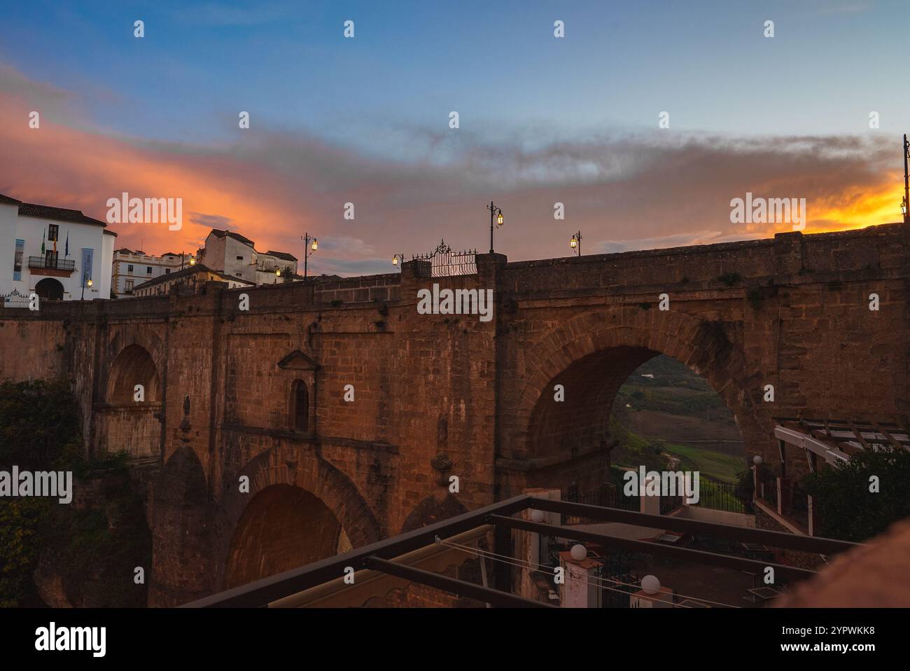 Puente Nuevo Bridge at Sunset in Ronda, Spain with Cliffside Buildings ...