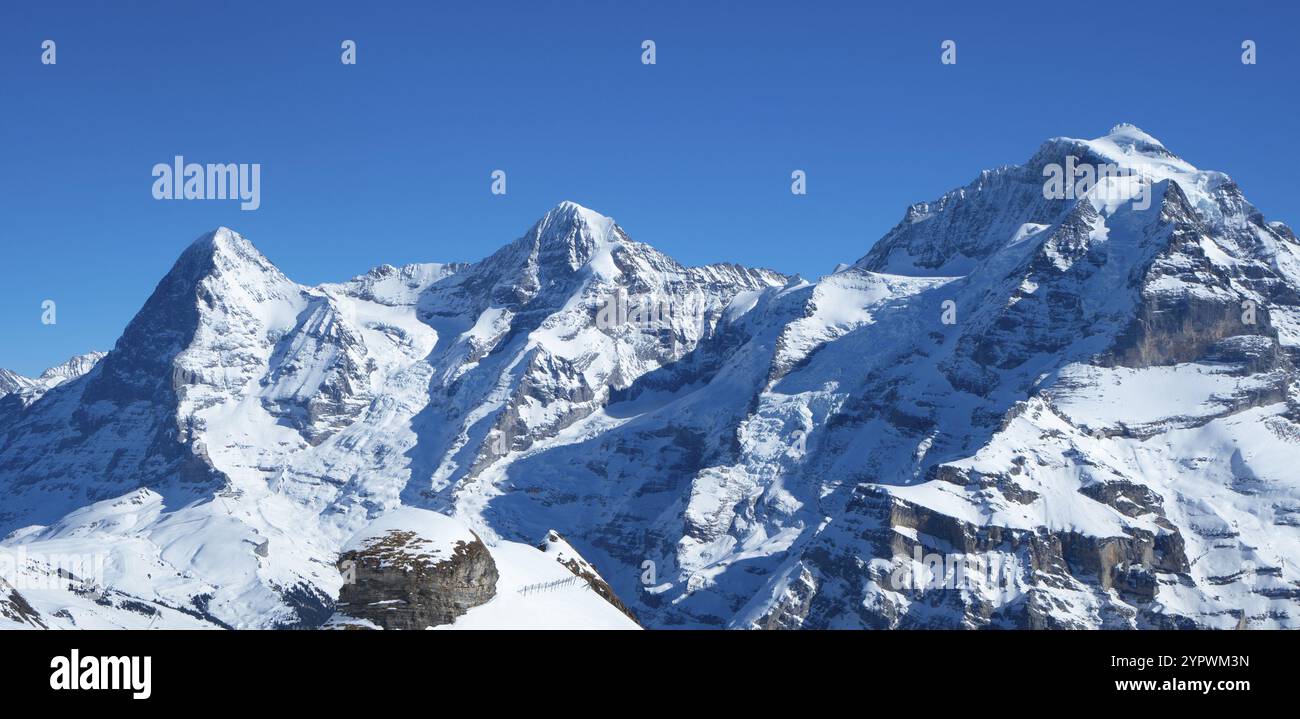 The famous Swiss mountains Jungfrau, Moench, and Eiger, in the daylight ...