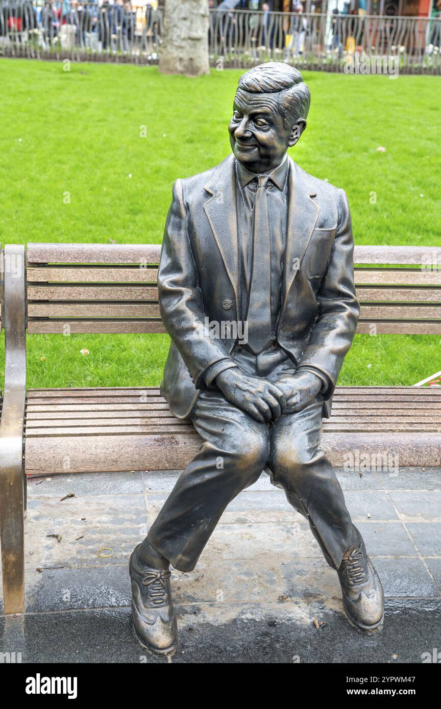 London, UK, March 22, 2024 : Statue of Mr Bean sitting on a bench ...