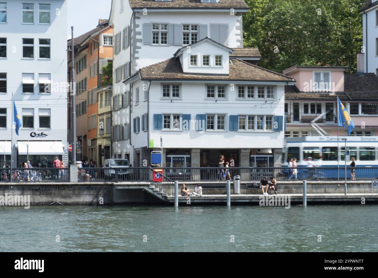 Old tramcar moving along Limmatquai, a famous street at the waterfront ...