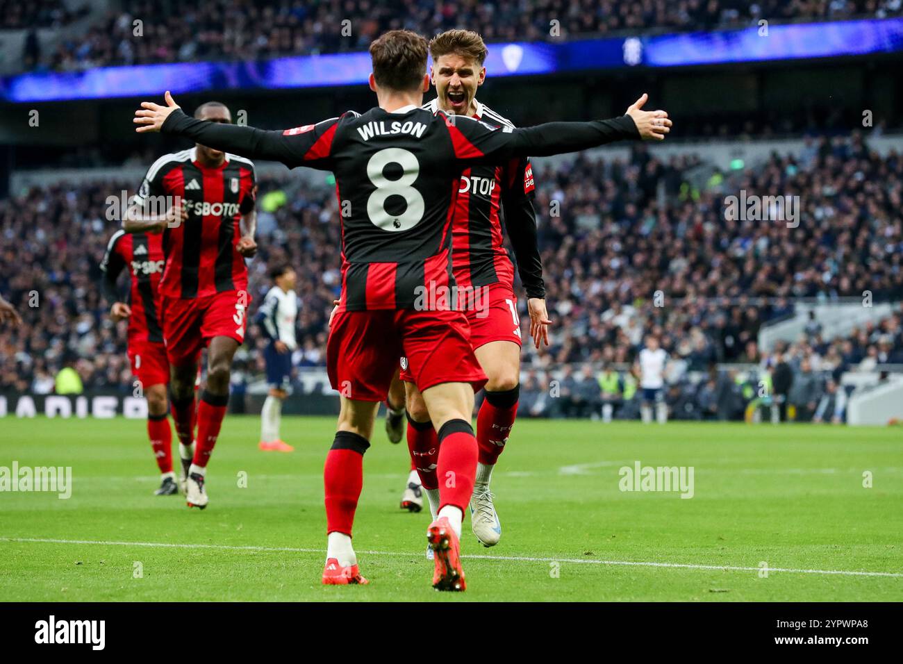 Tom Cairney of Fulham celebrates his goal with Harry Wilson to make it ...