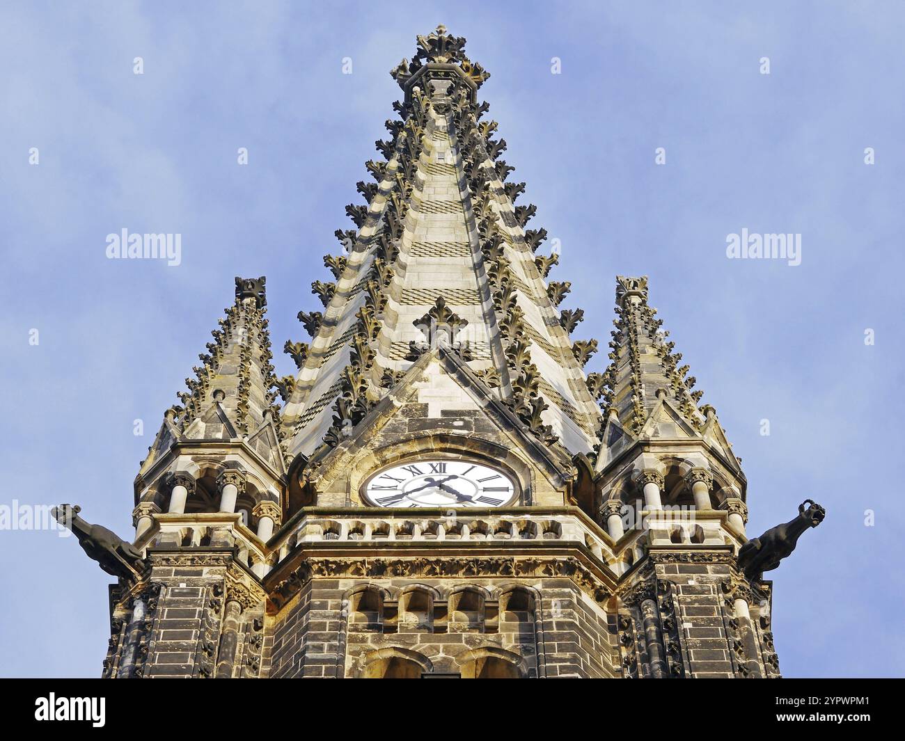 View upwards to the tower, tower clock and gargoyles of the neo-Gothic ...