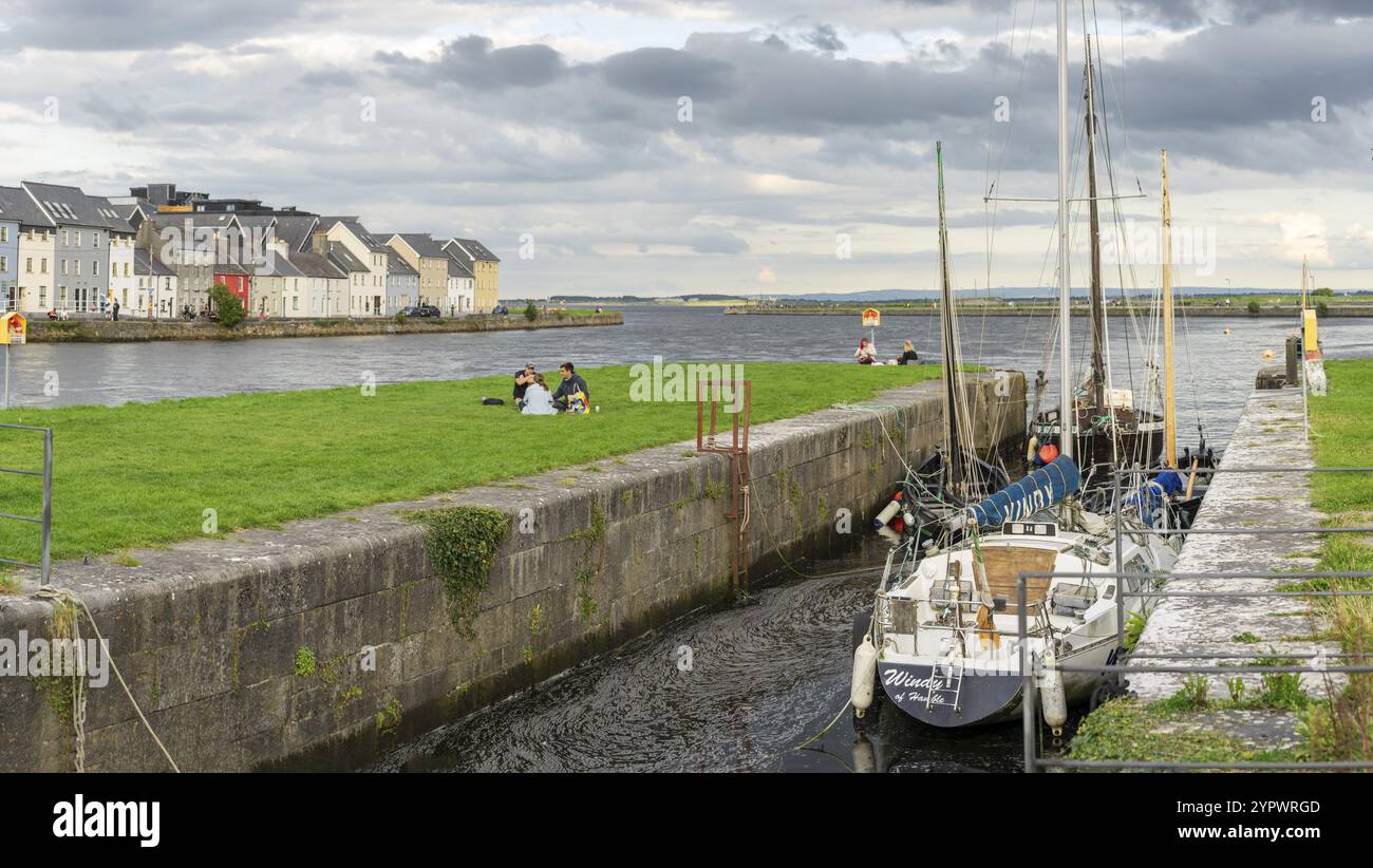 Boat anchored in Eglinton Canal Sea Lock, The Long Walk, Galway ...