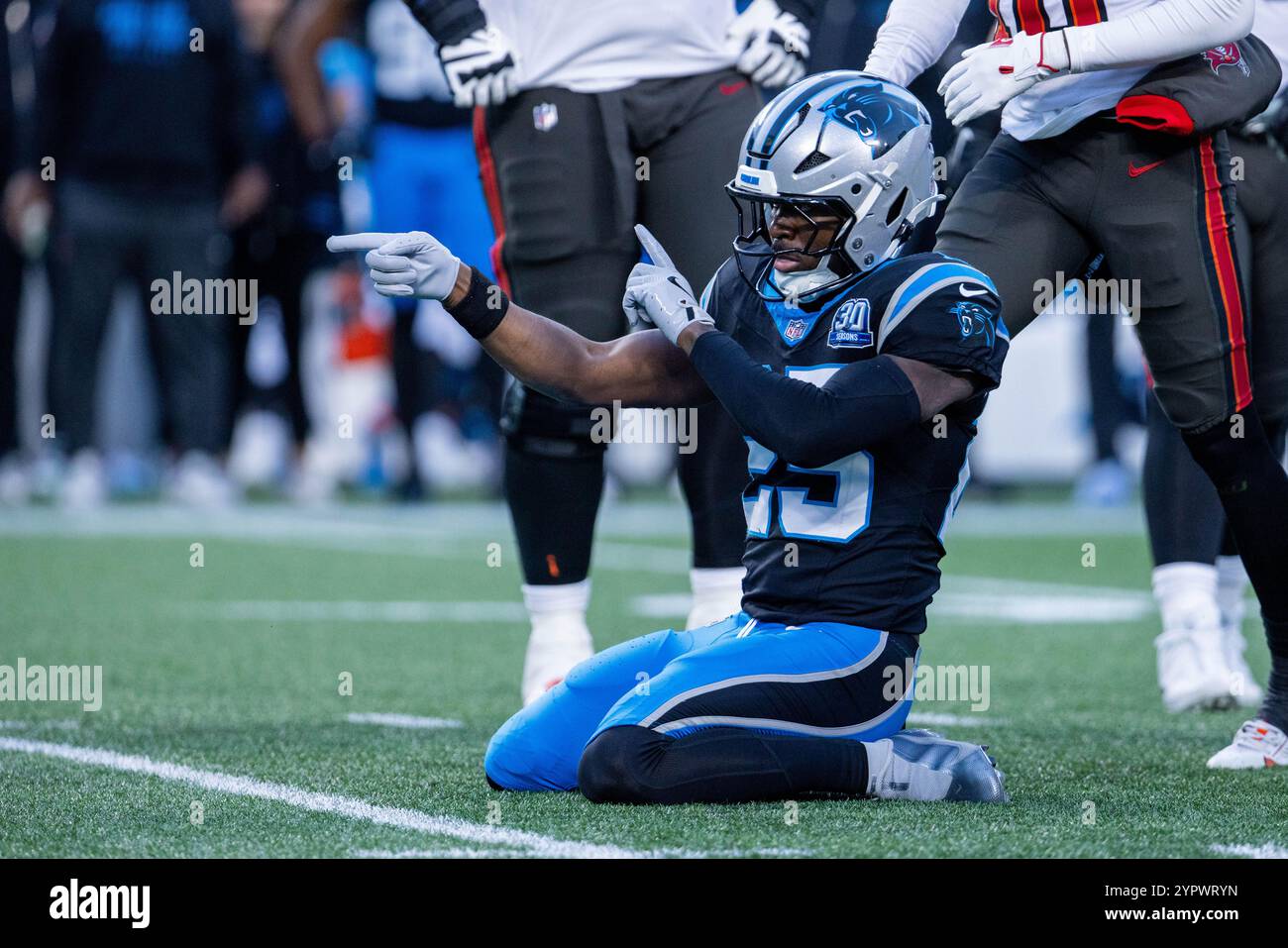 December 1, 2024: Carolina Panthers safety Xavier Woods (25) celebrates ...