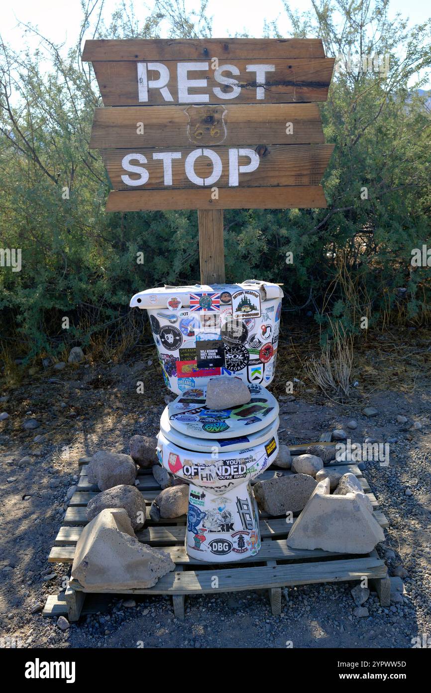 A toilet bowl with a Rest Stop sign on it. This humorous display is ...