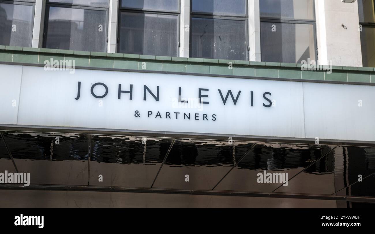 London, UK, March 23, 2024 : John Lewis and partners storefront sign in ...