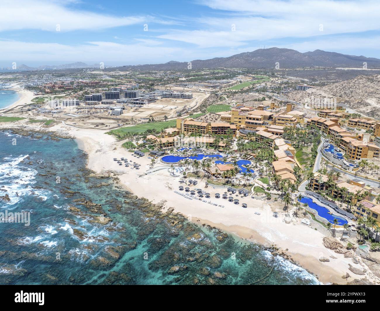 Aerial view of tropical beach with resorts in Cabo San Jose, Baja ...