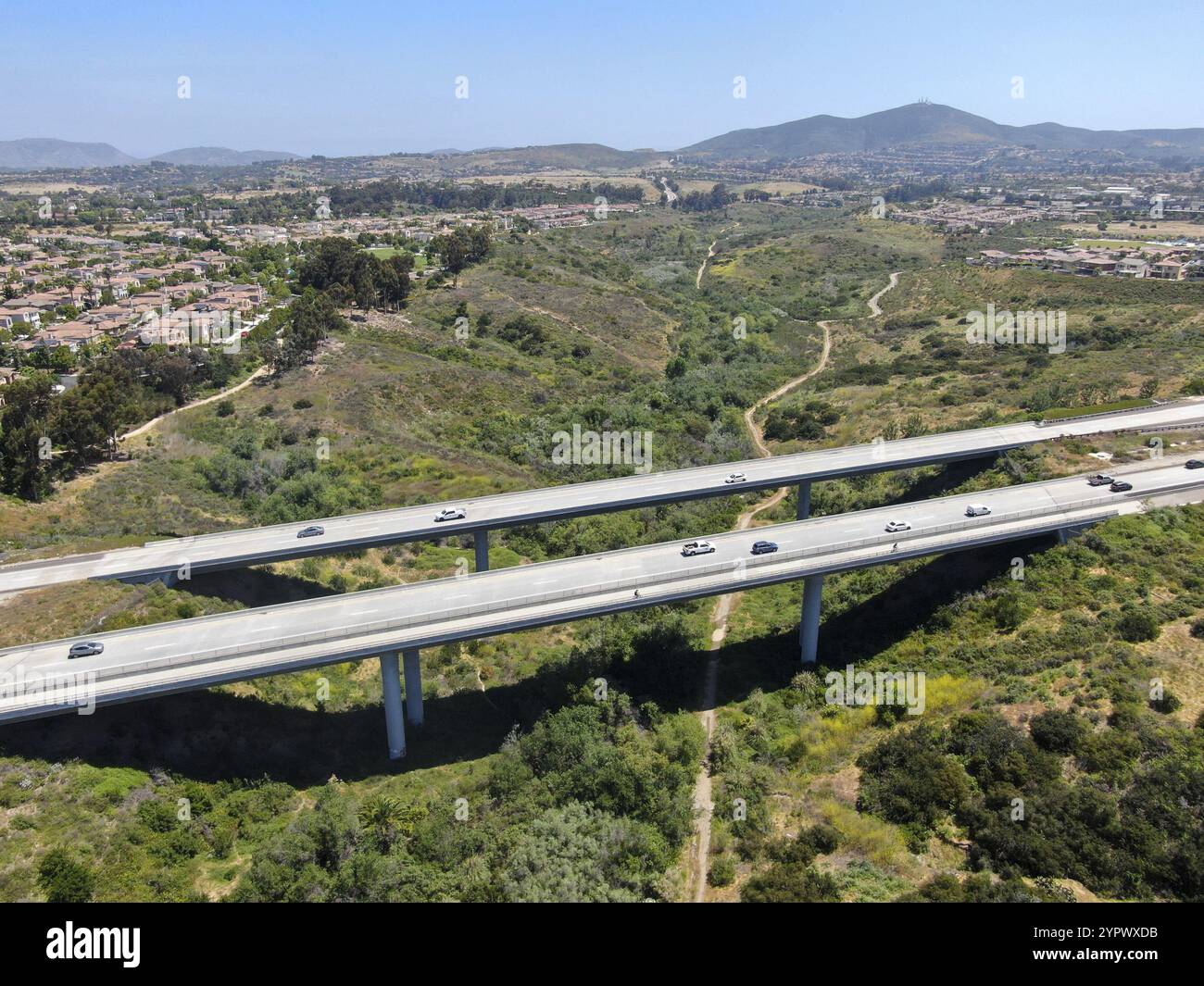 Aerial view of road highway bridge, viaduct supports in the valley ...