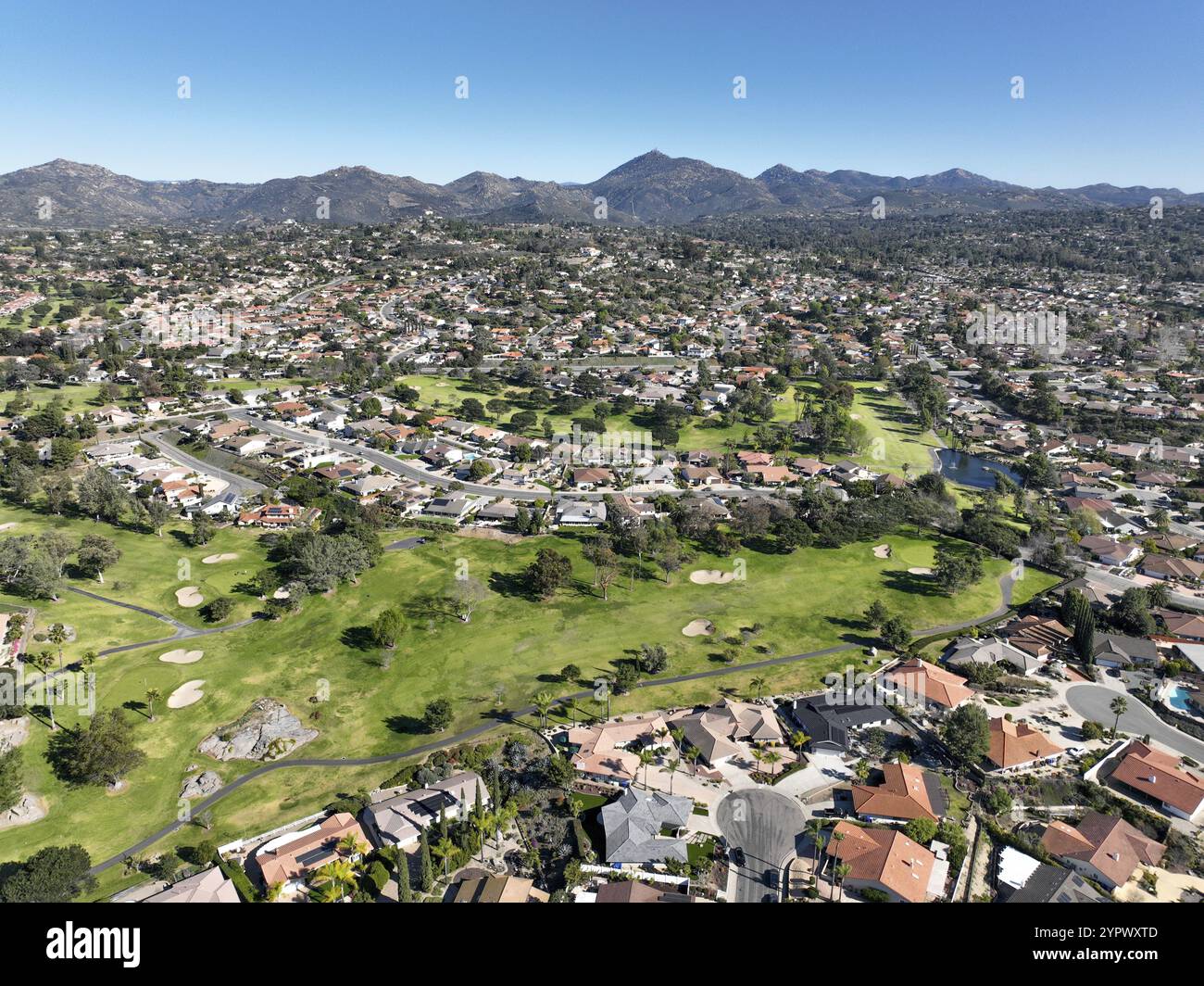 Aerial view of green golf in upscale residential neighborhood in South ...