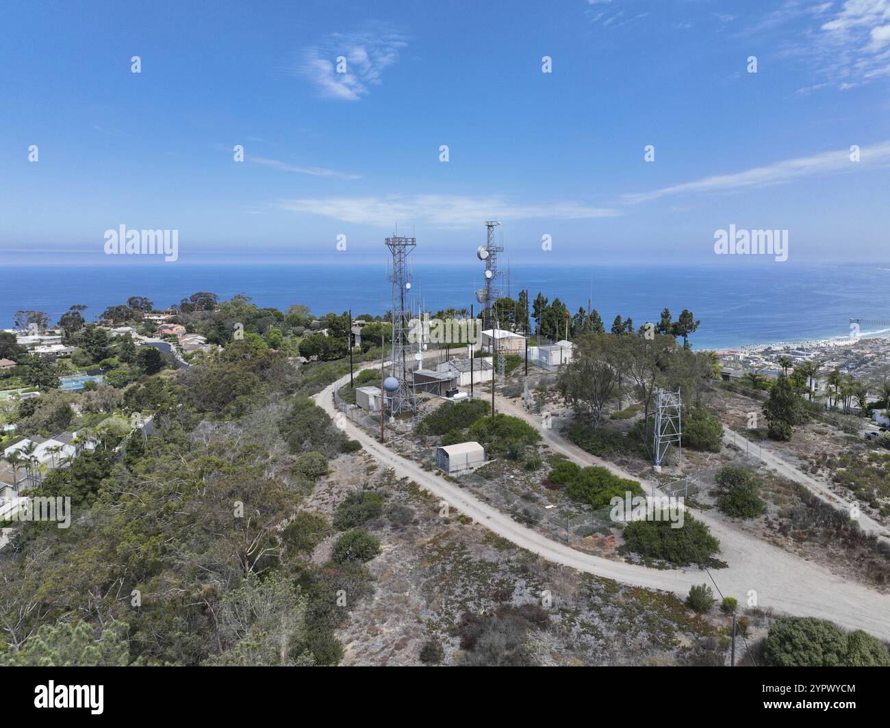 Engineer with safety equipment on high tower for working telecom ...