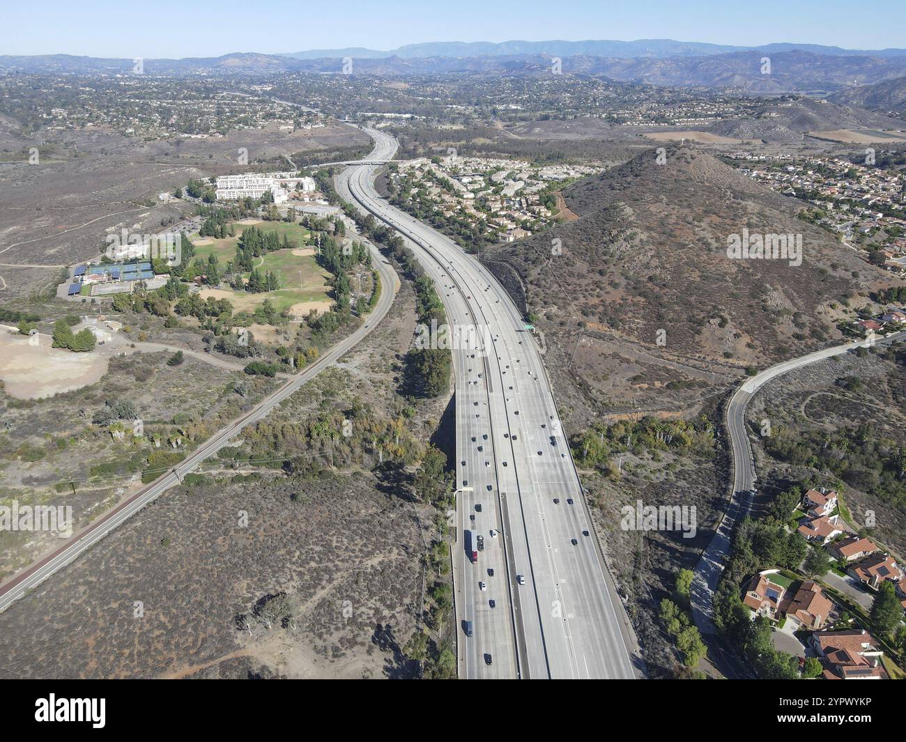 Aerial view of highway with traffic surrounded by houses, Interstate 15 ...