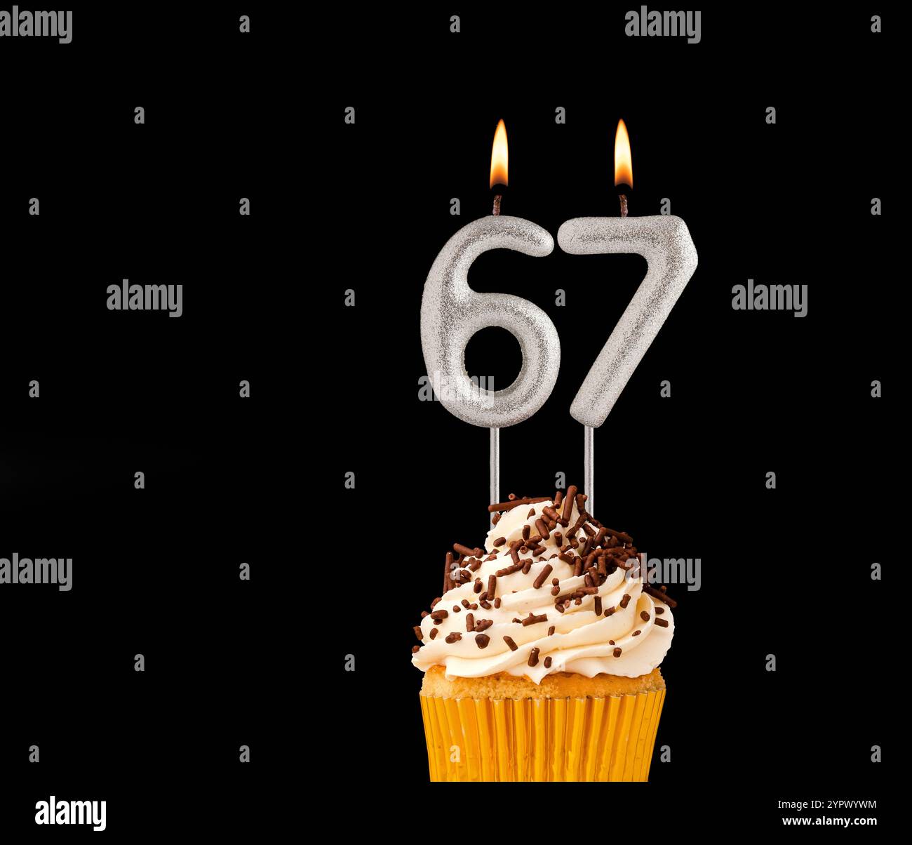 Birthday cupcake on black background - Number 67 shaped candles Stock ...