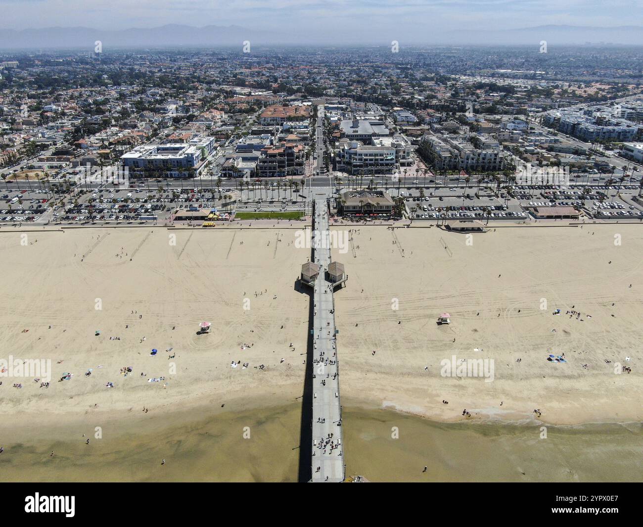 Aerial view of Huntington Pier, beach and coastline during sunny summer ...