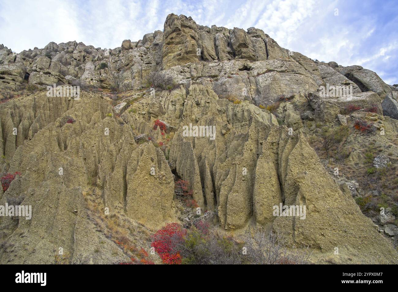 Fancy clay figures formed as a result of soil erosion and weathered on ...