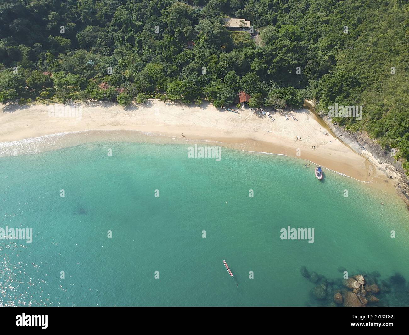 Aerial view of white sandy beach with turquoise water in tropical ...