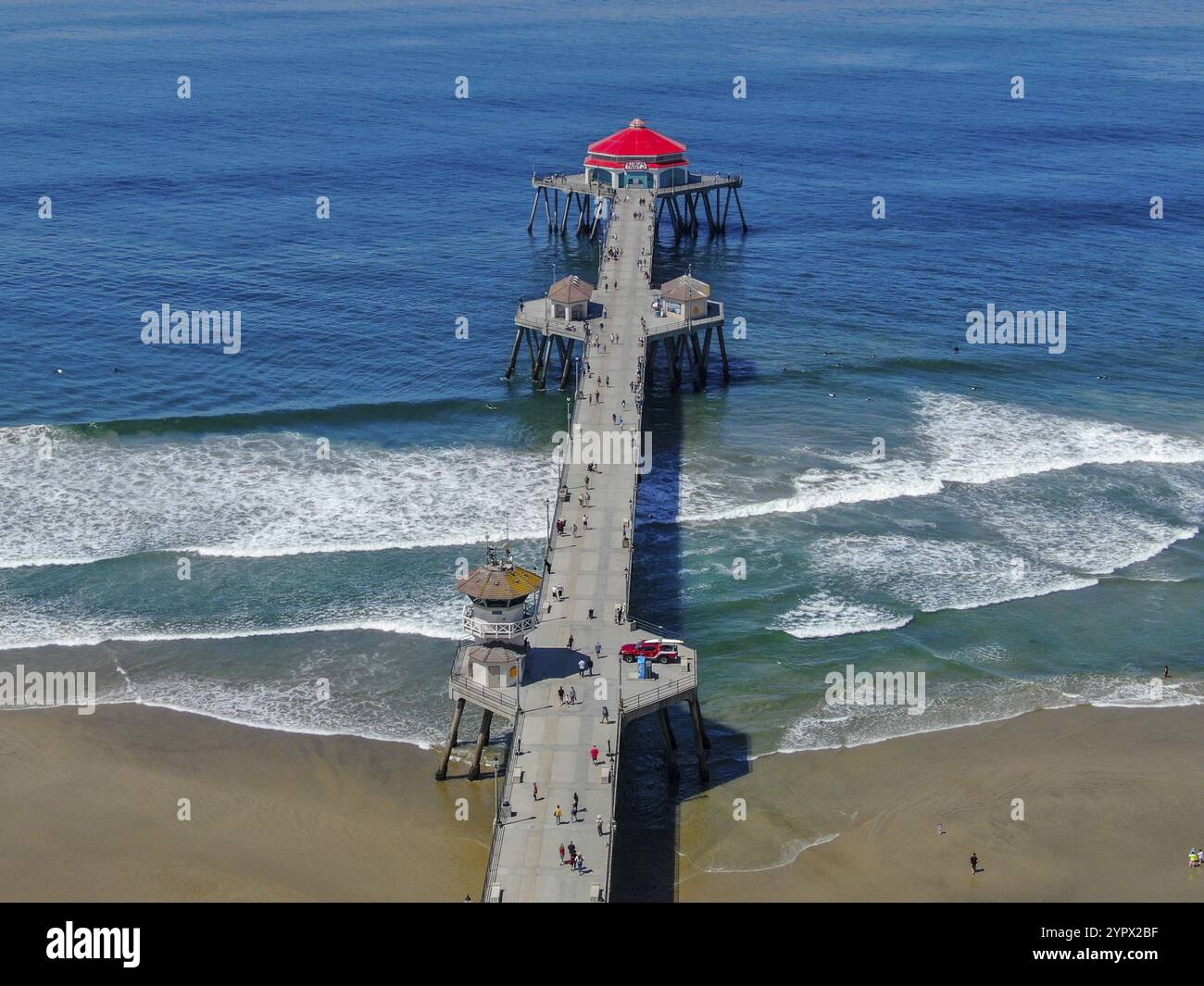 Aerial view of Huntington Pier, beach and coastline during sunny summer ...