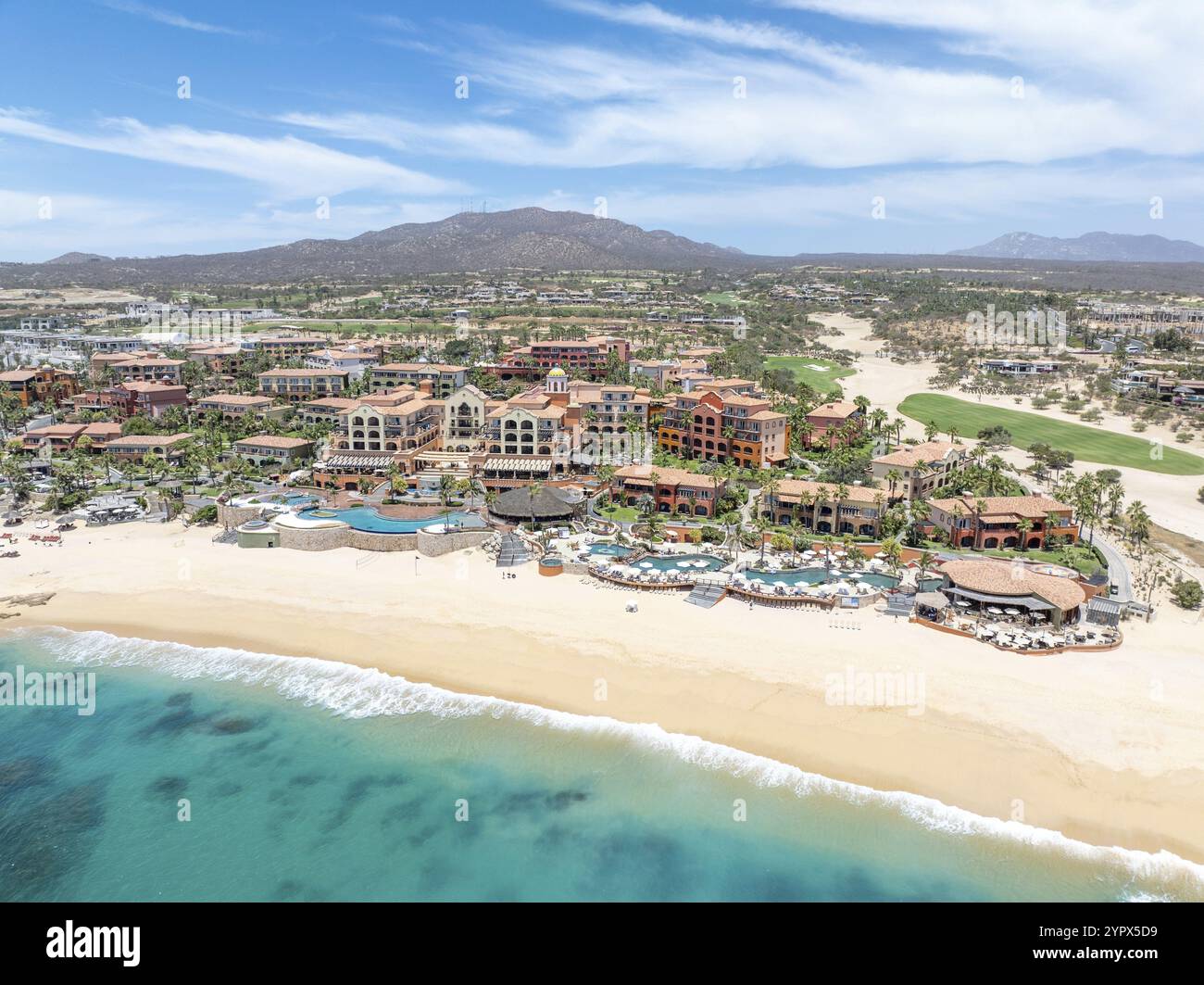 Aerial view of tropical beach with resorts in Cabo San Jose, Baja ...
