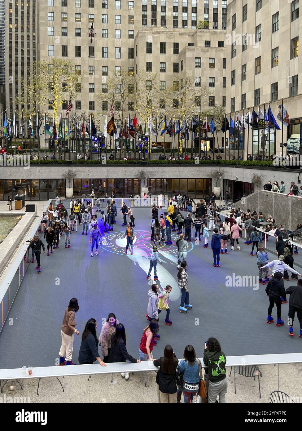 People are seen roller skating at Rockefeller Center in New York City ...