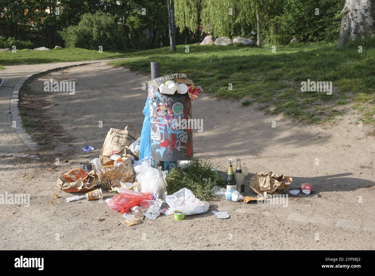 People disposing garbage hi-res stock photography and images - Alamy