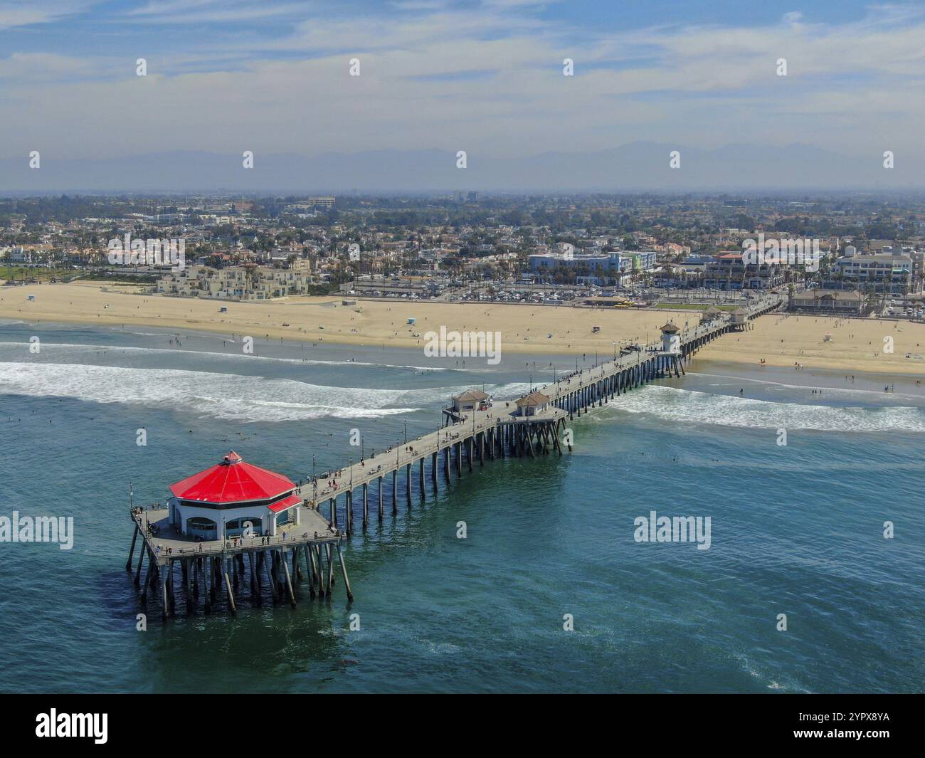 Aerial view of Huntington Pier, beach and coastline during sunny summer ...