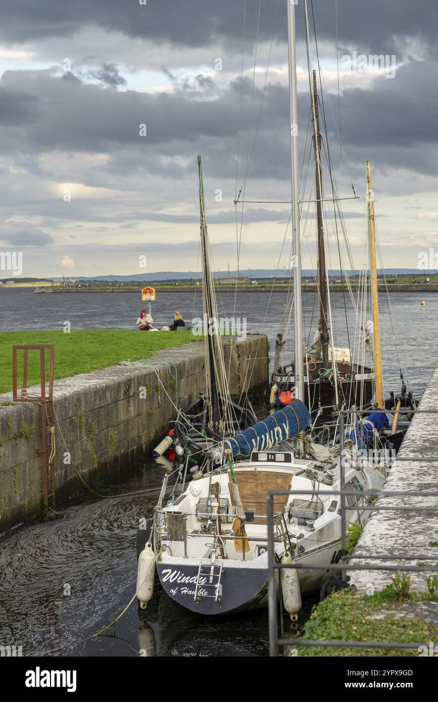 Boat anchored in Eglinton Canal Sea Lock, The Long Walk, Galway ...