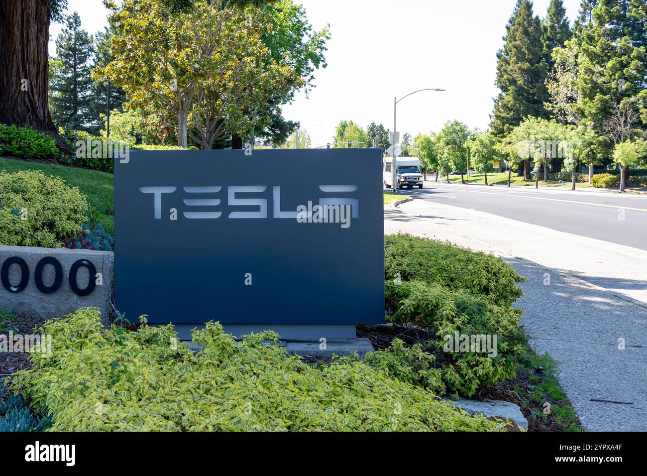 A Tesla sign is seen in Silicon Valley, Palo Alto, California, USA ...