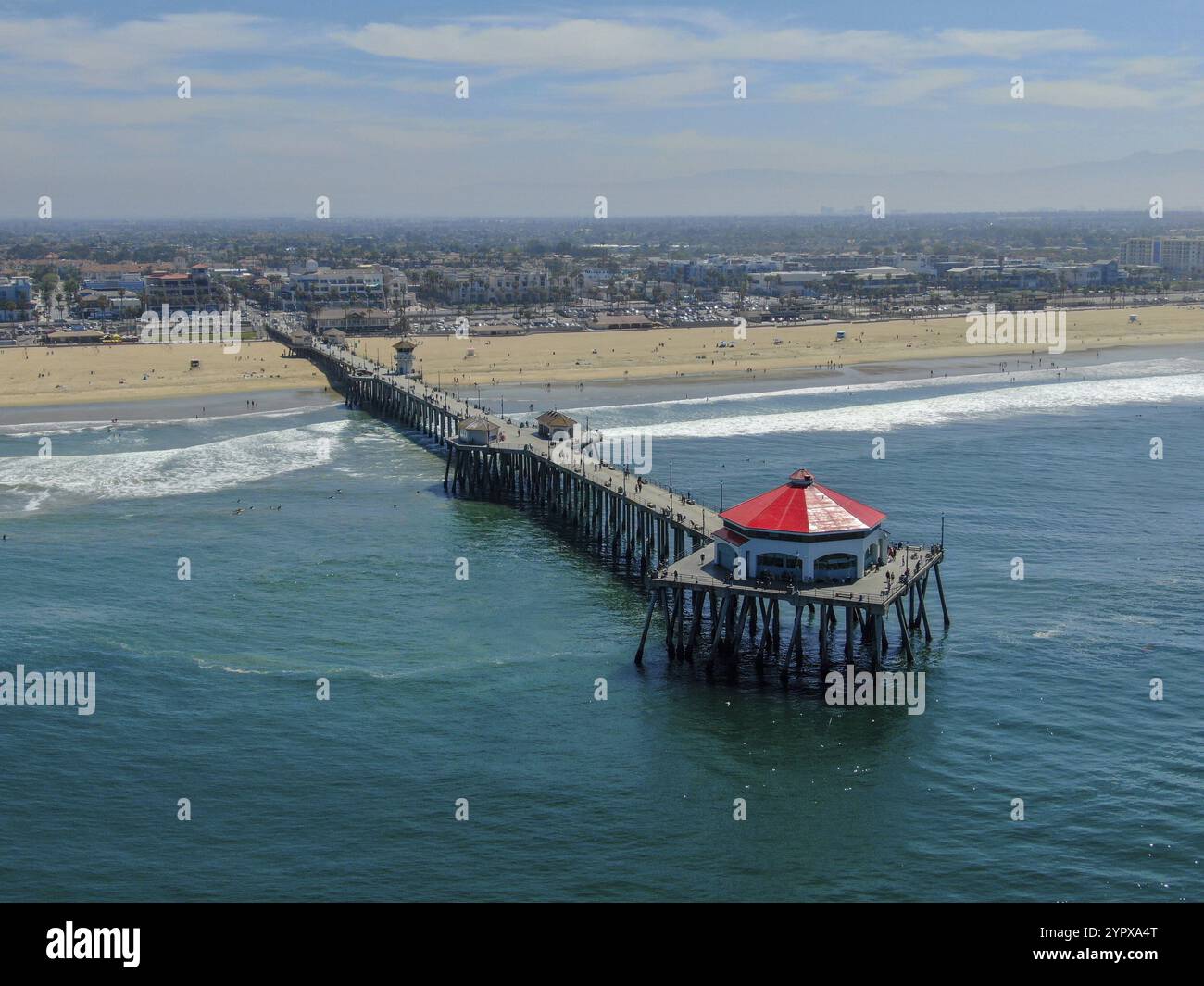 Aerial view of Huntington Pier, beach and coastline during sunny summer ...