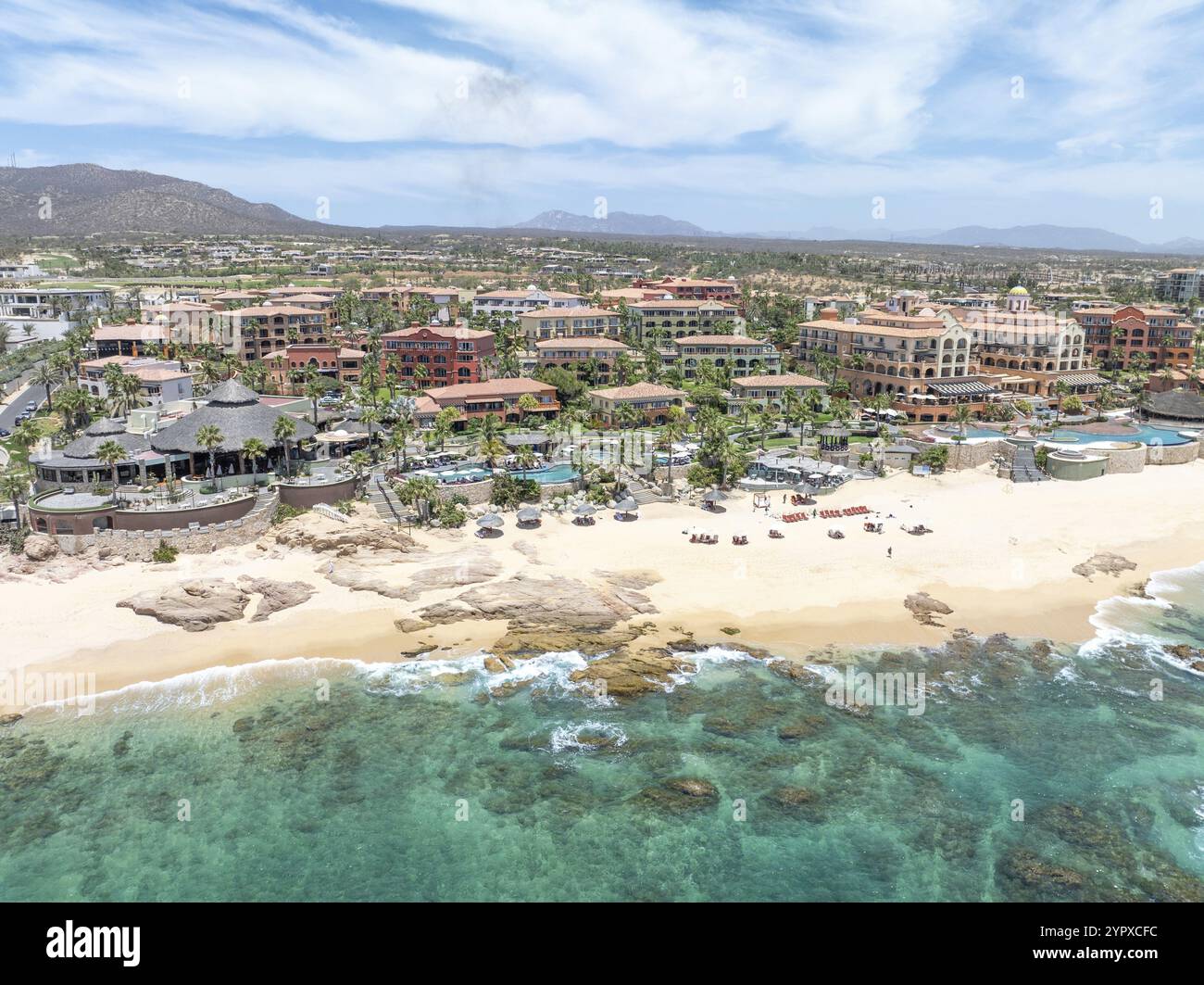 Aerial view of tropical beach with resorts in Cabo San Jose, Baja ...