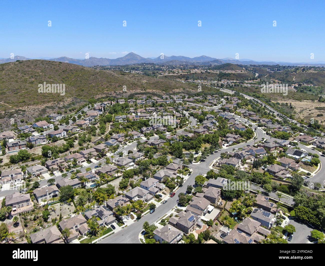 Aerial view of suburban neighborhood with big mansions in San Diego ...