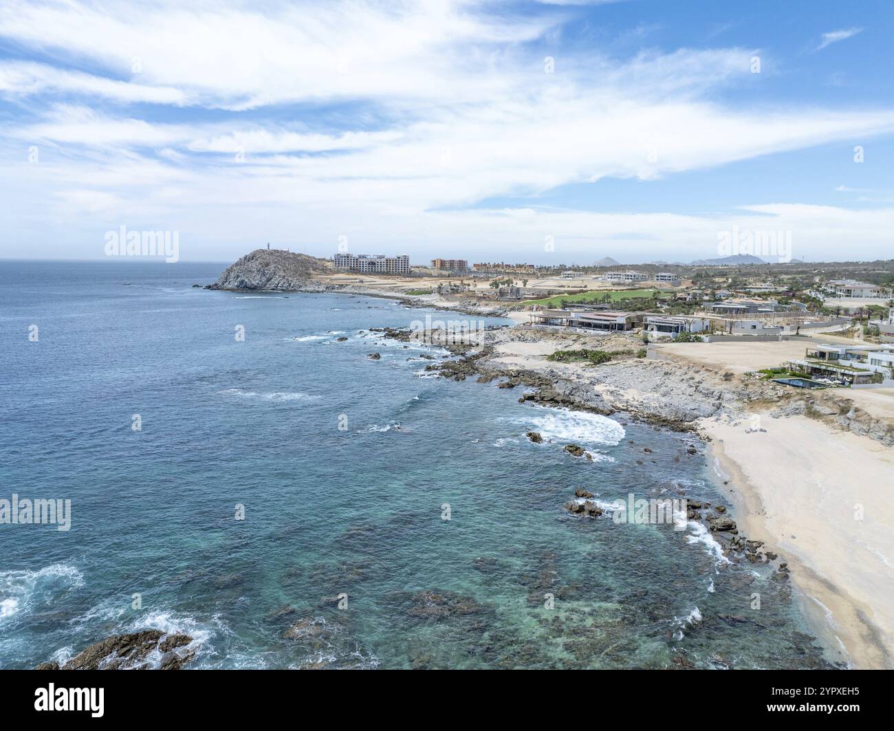 Aerial view of tropical beach with resorts in Cabo San Jose, Baja ...