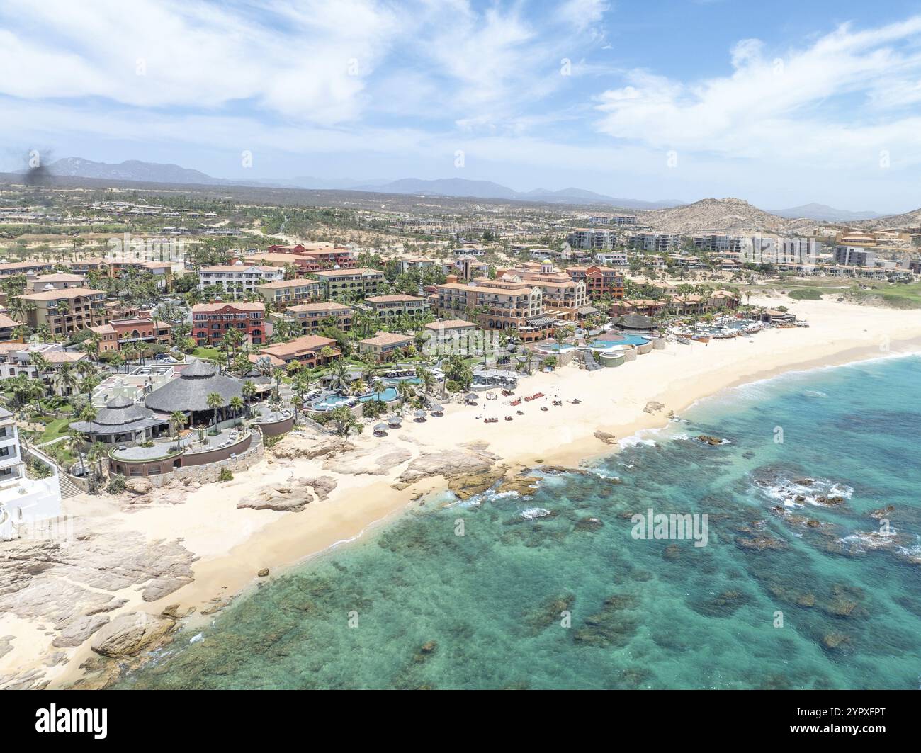 Aerial view of tropical beach with resorts in Cabo San Jose, Baja ...