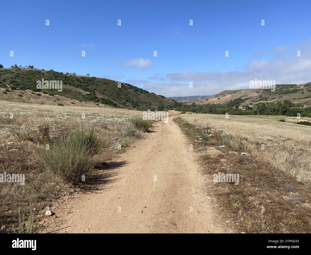 Dry dusty trails in the valley with blue sky, San Diego, California ...