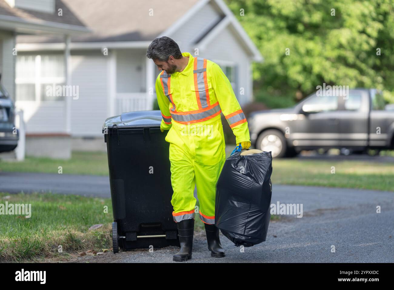 Keeping garbage plastic in bag for trash. Pollution and recycling. Man ...