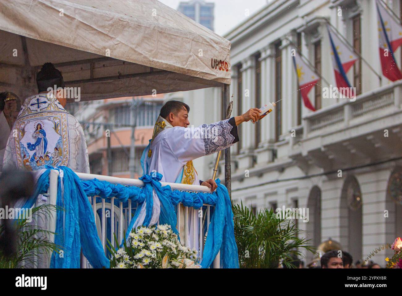 Quezon City, Quezon, Philippines. 1st Dec, 2024. A bishop blesses the ...