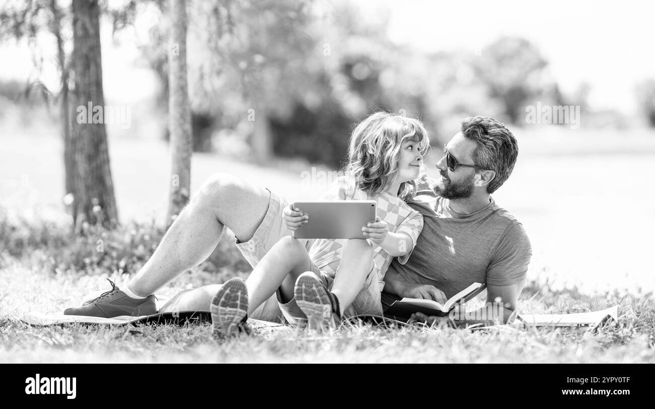 son with father study in summer. family education of father and son kid ...