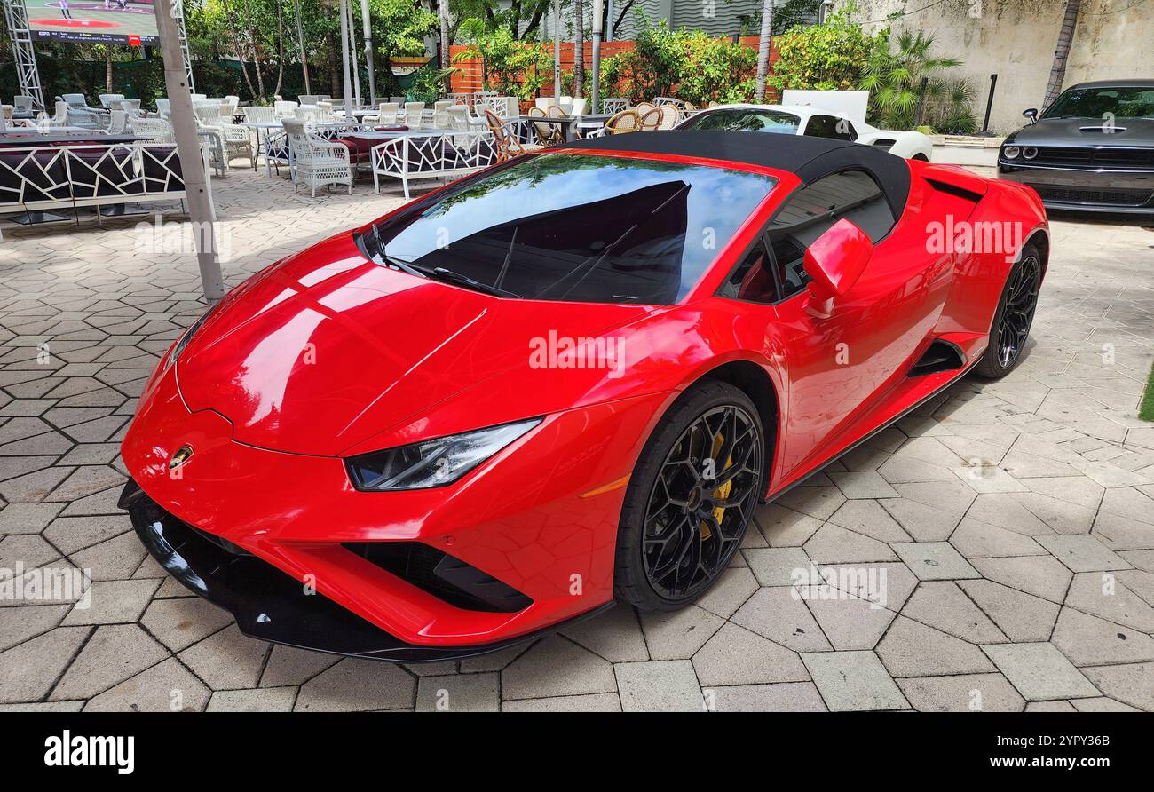 Miami Beach, Florida USA - June 8, 2024: Lamborghini Huracan red at Miami beach. Lamborghini is ...