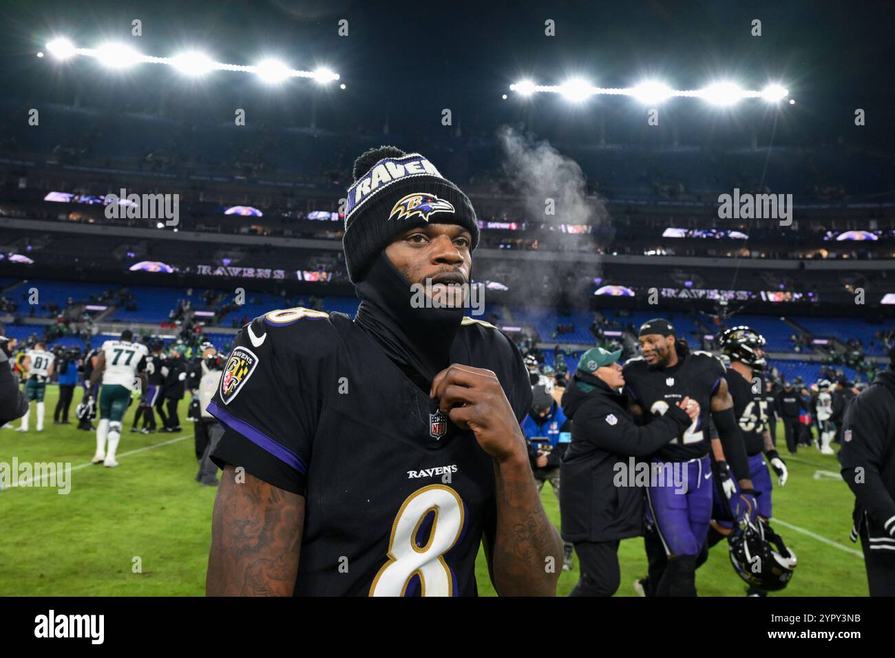 Baltimore Ravens quarterback Lamar Jackson (8) walks off the field ...