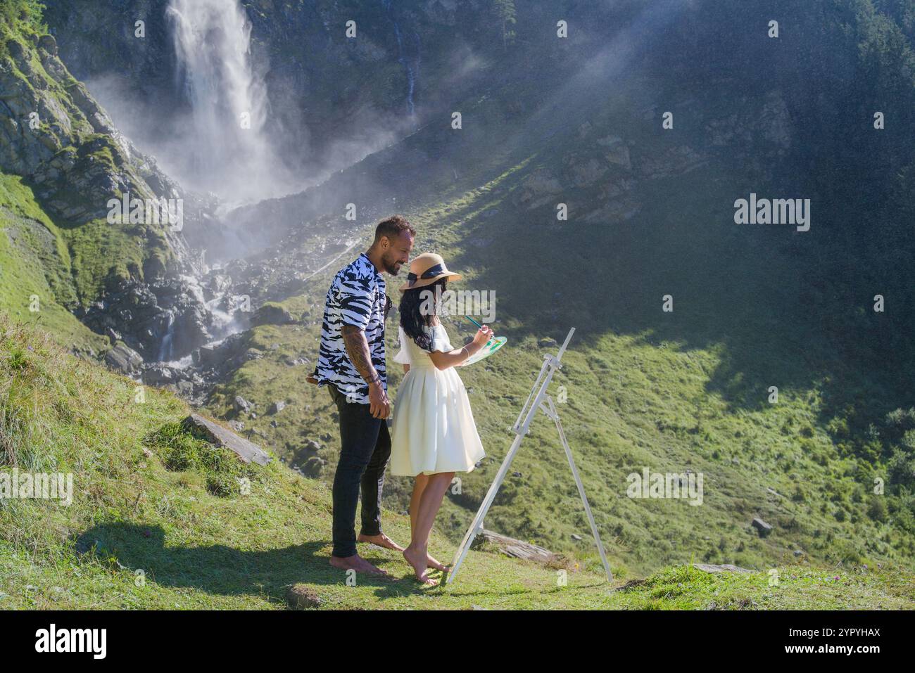 Romantic couple together on nature background. Artist couple in love ...
