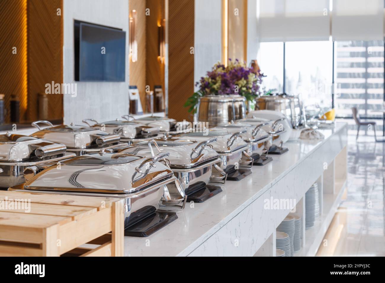 heating trays setup on the buffet line ready for service. breakfast and ...