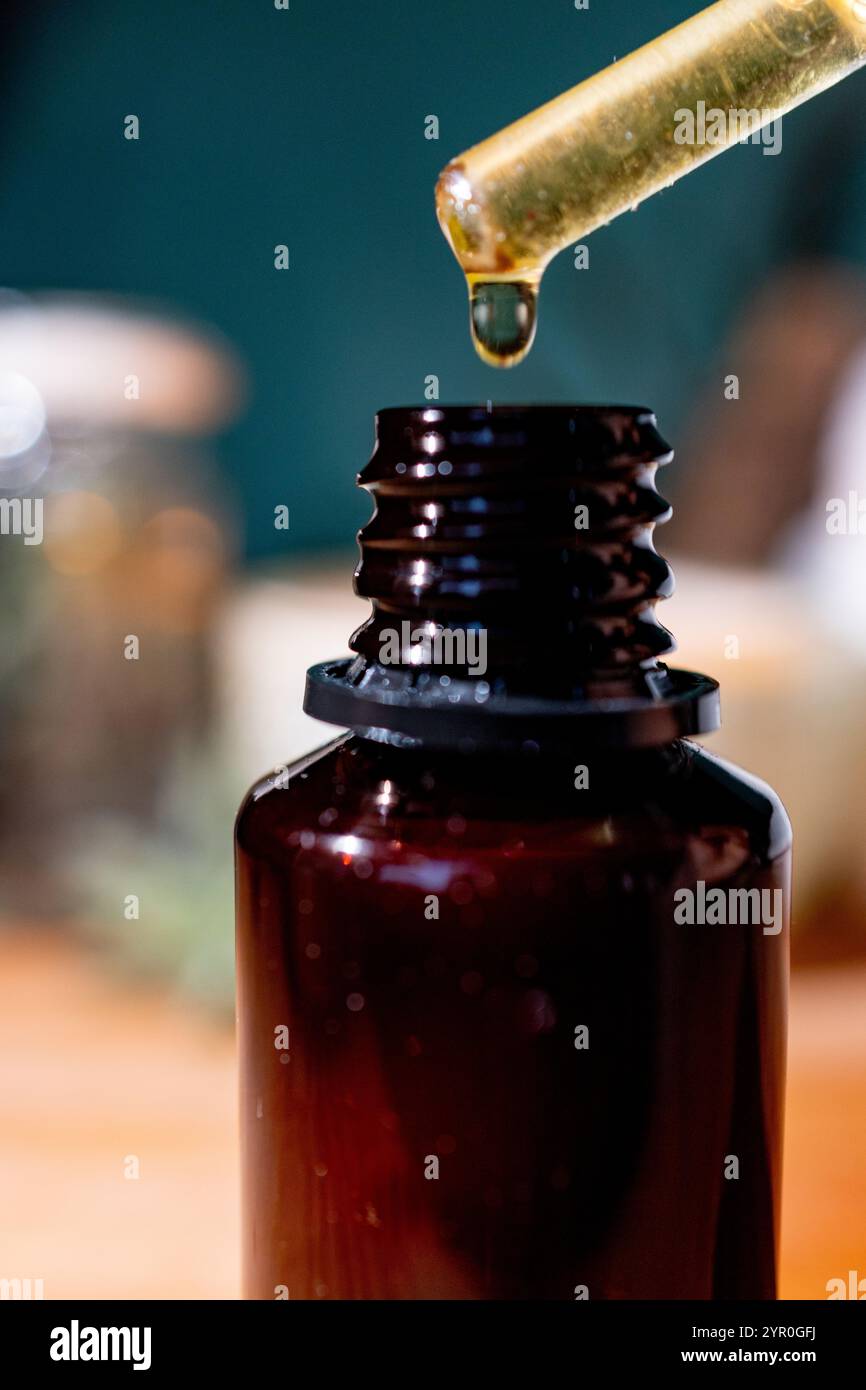 Drop falling from pipette.Close up picture Stock Photo - Alamy