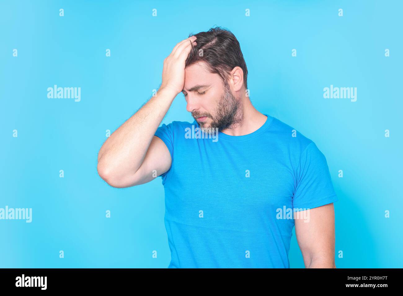 Man suffering from headache. Tired, headache and eye strain. Man with ...