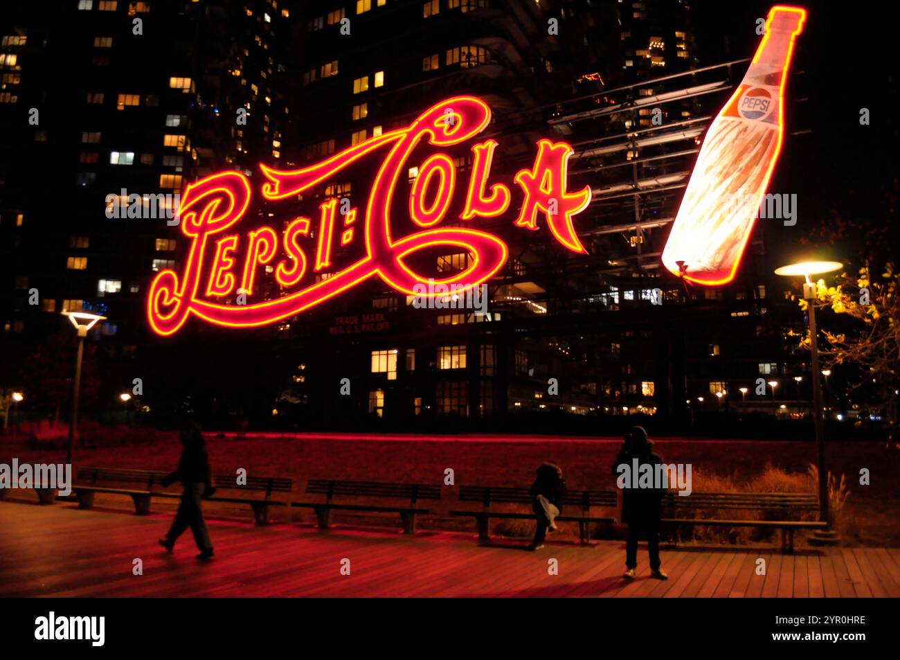 People are seen in front of the Pepsi Cola sign in Gantry Plaza State ...