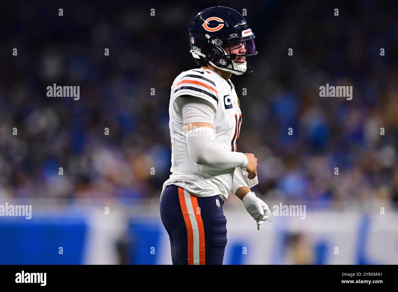 Chicago Bears quarterback Caleb Williams walks to the huddle during the ...