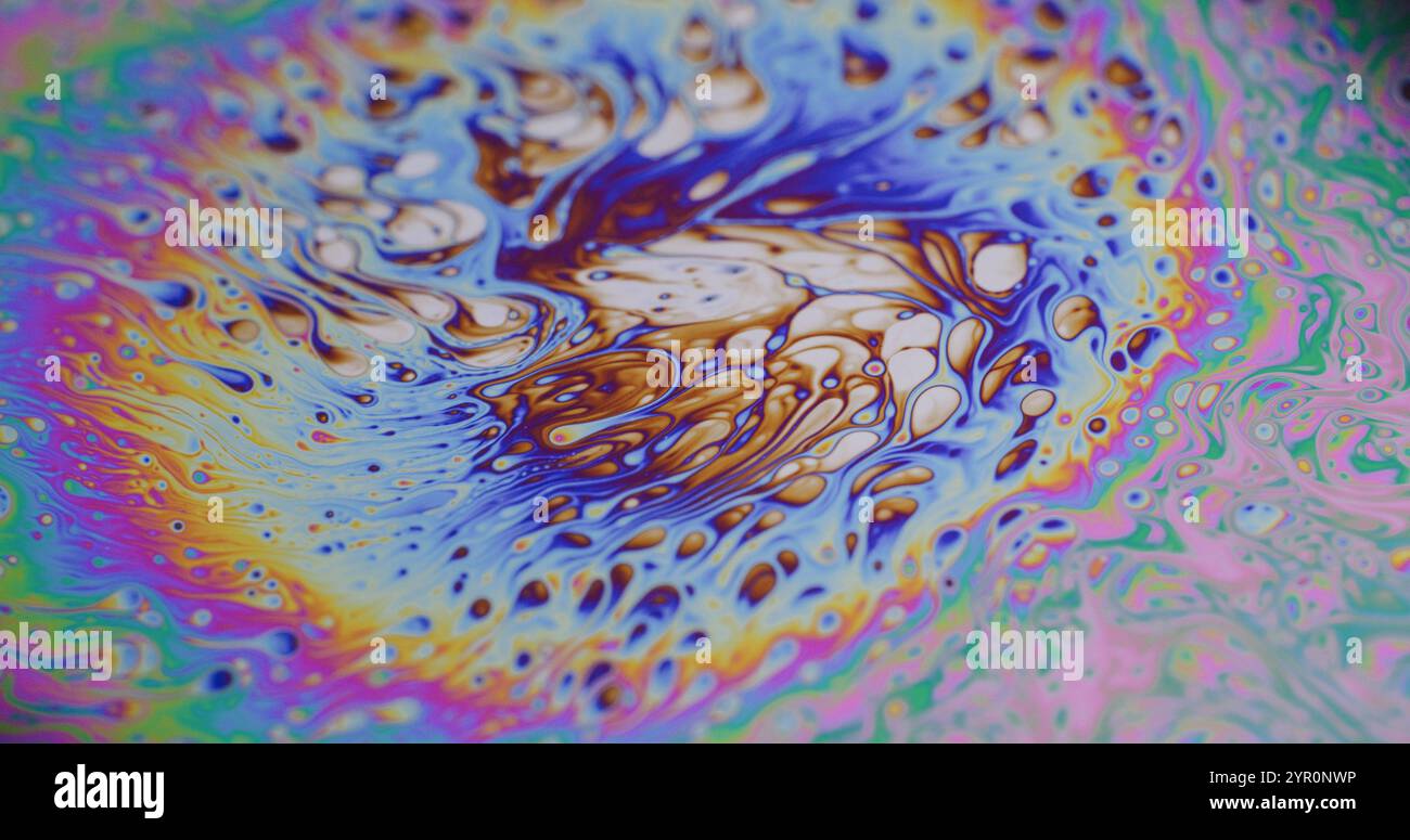 Acid liquid. Bubble paint. Defocused multicolor purple green oil ...