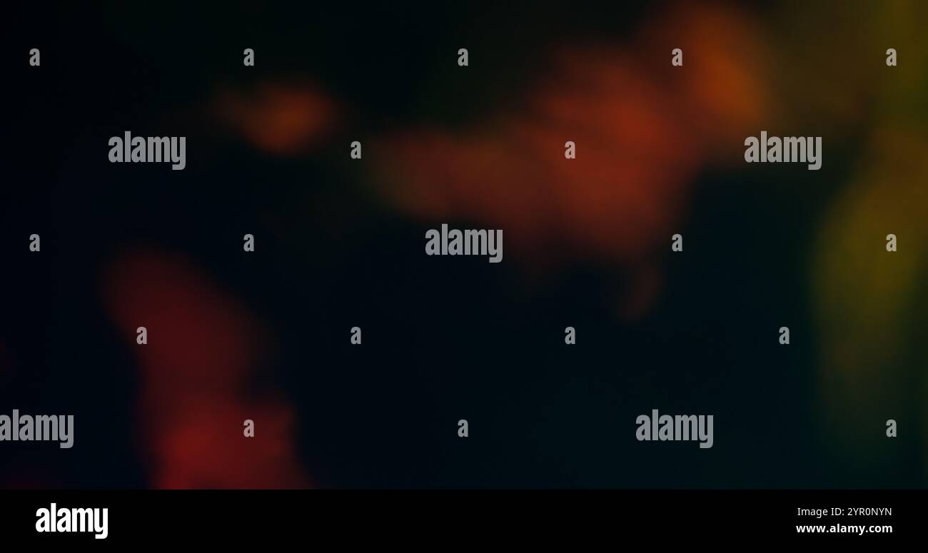 Abstract blur. Flare light. Sparkling blinking yellow orange blue ...