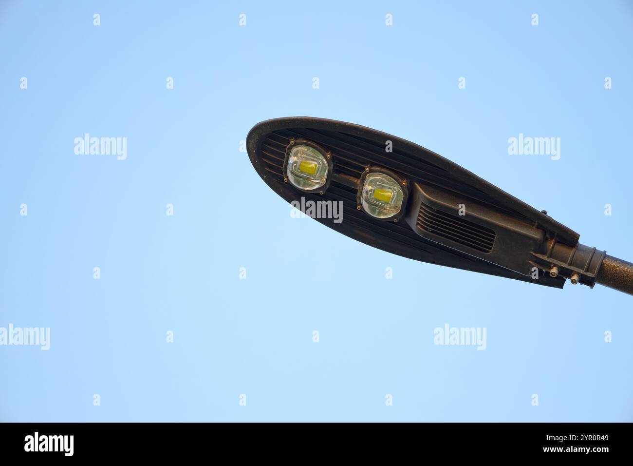 Modern street lighting with two LEDs, urban development, city park ...