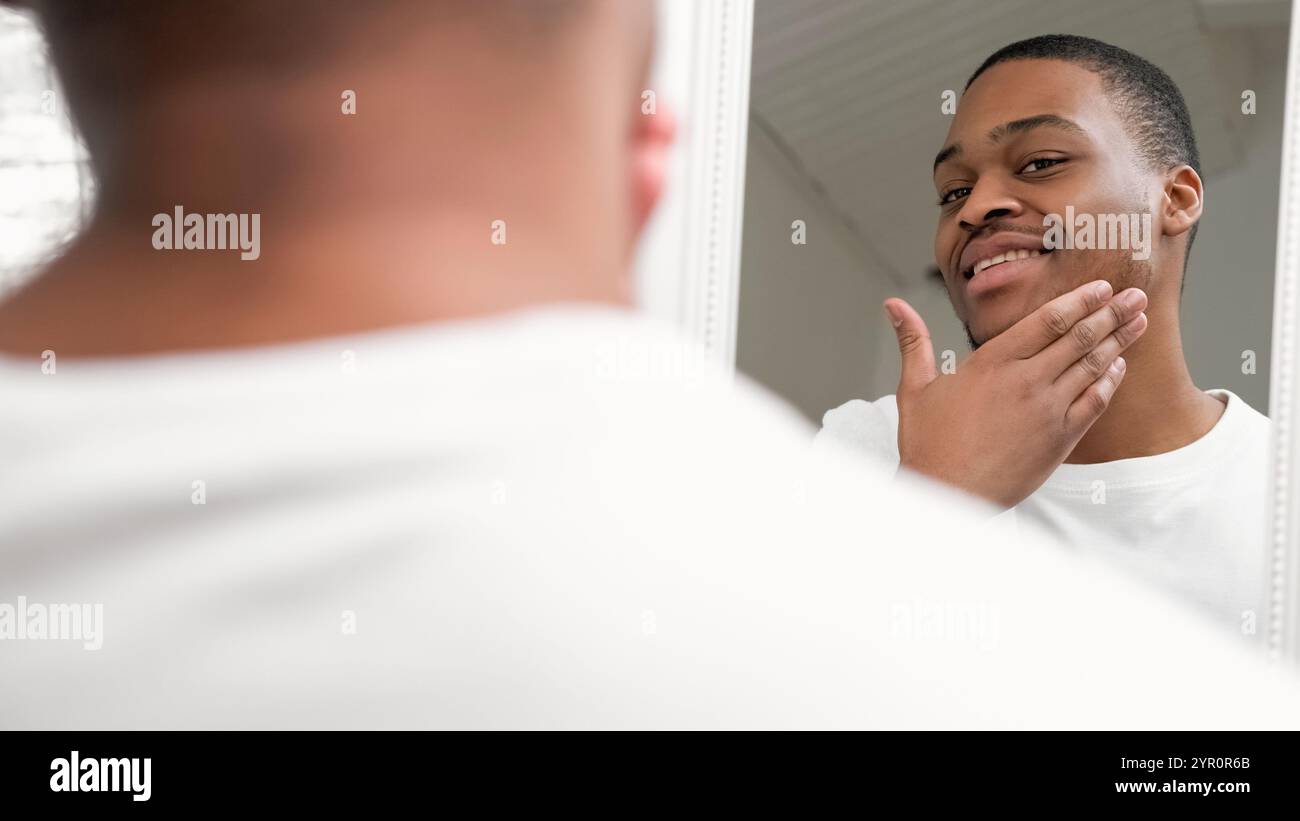 Skin routine. Facial care. Wellbeing freshness. Satisfied smiling man ...