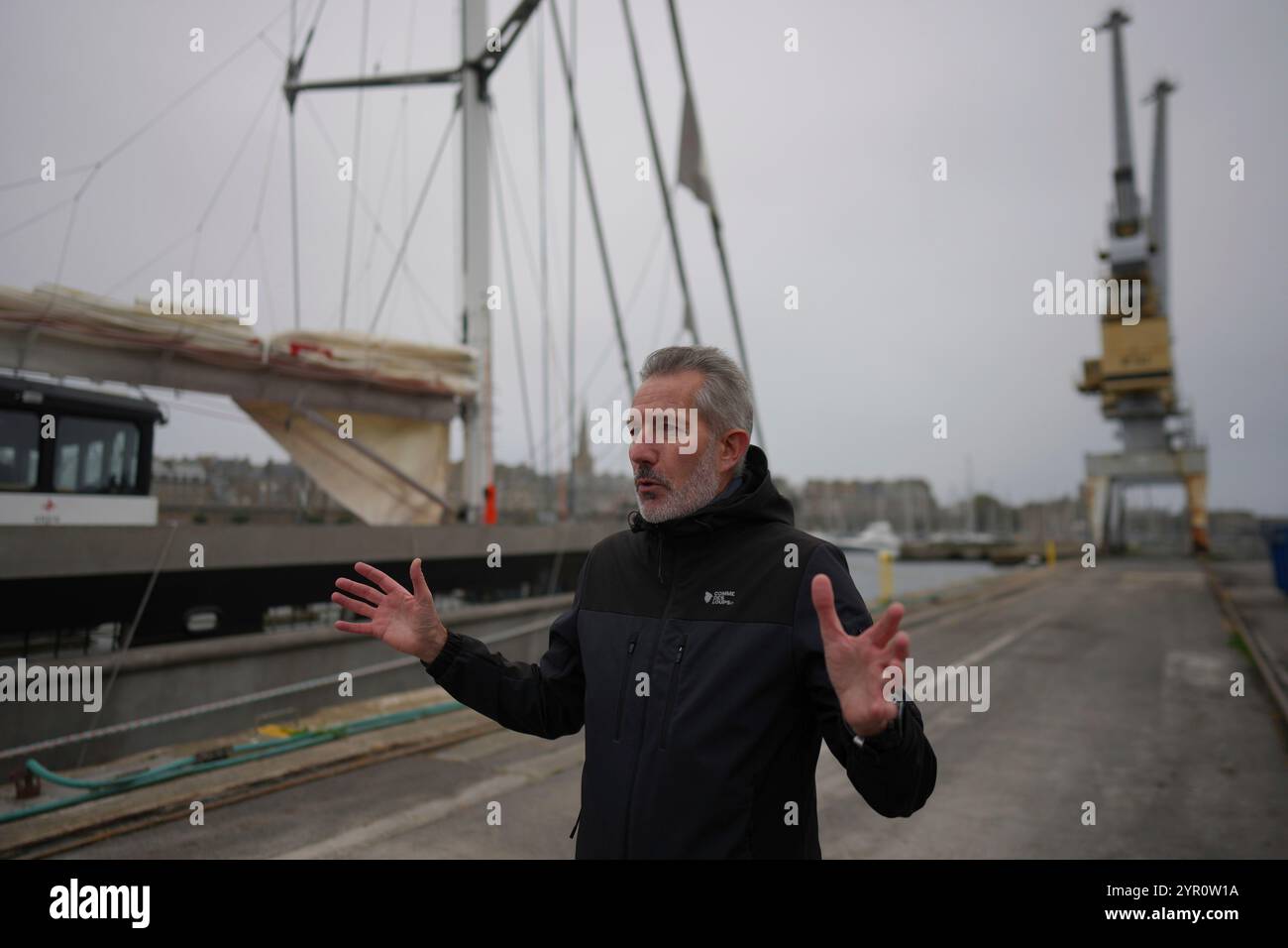 Grain de Sail general manager Jacques Barreau gestures during an ...